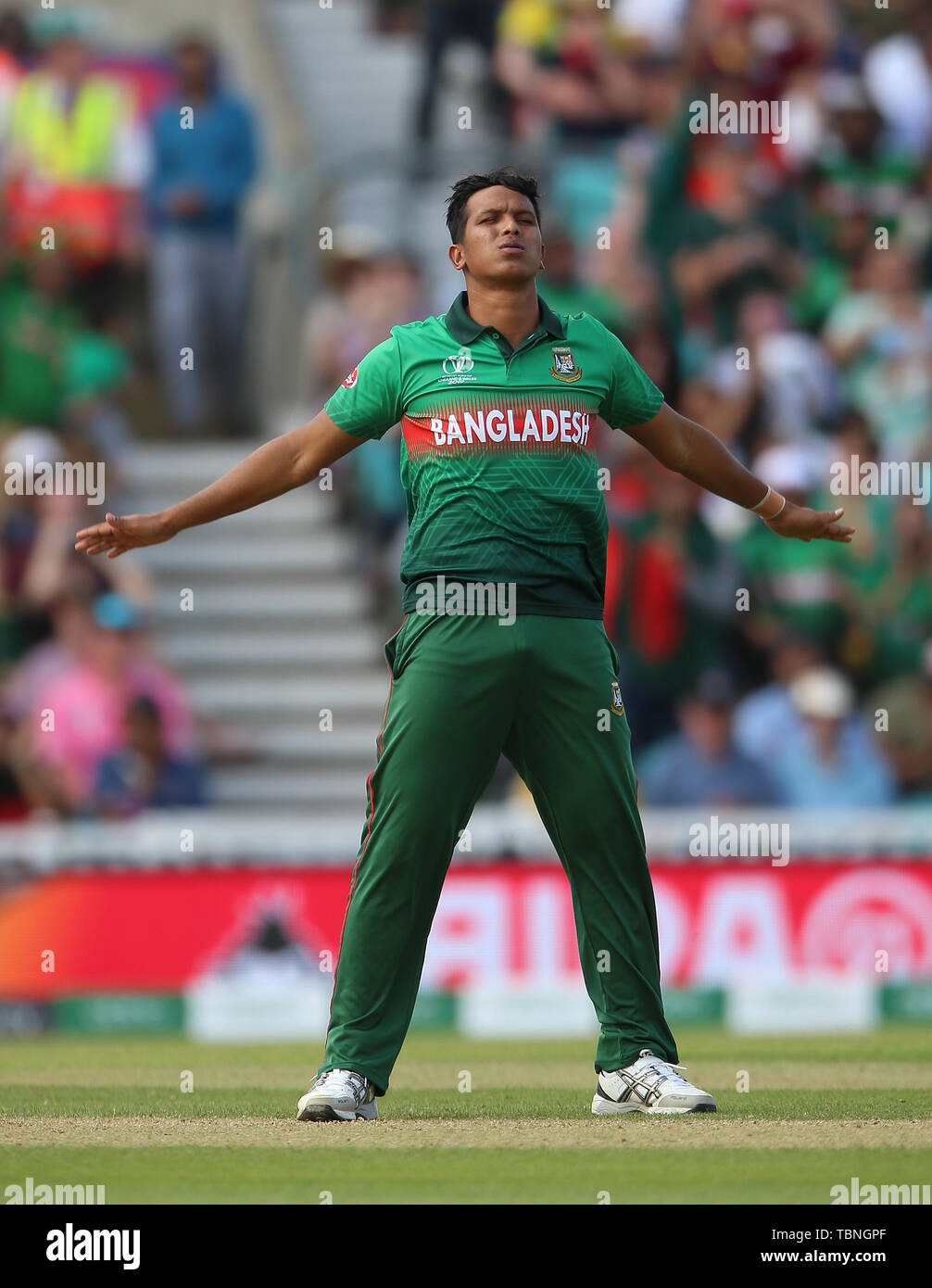 Bangladesh's Mohammad Saifuddin celebrates after taking the wicket of ...