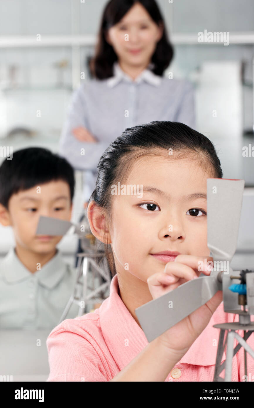 Three students in physics hi-res stock photography and images - Alamy