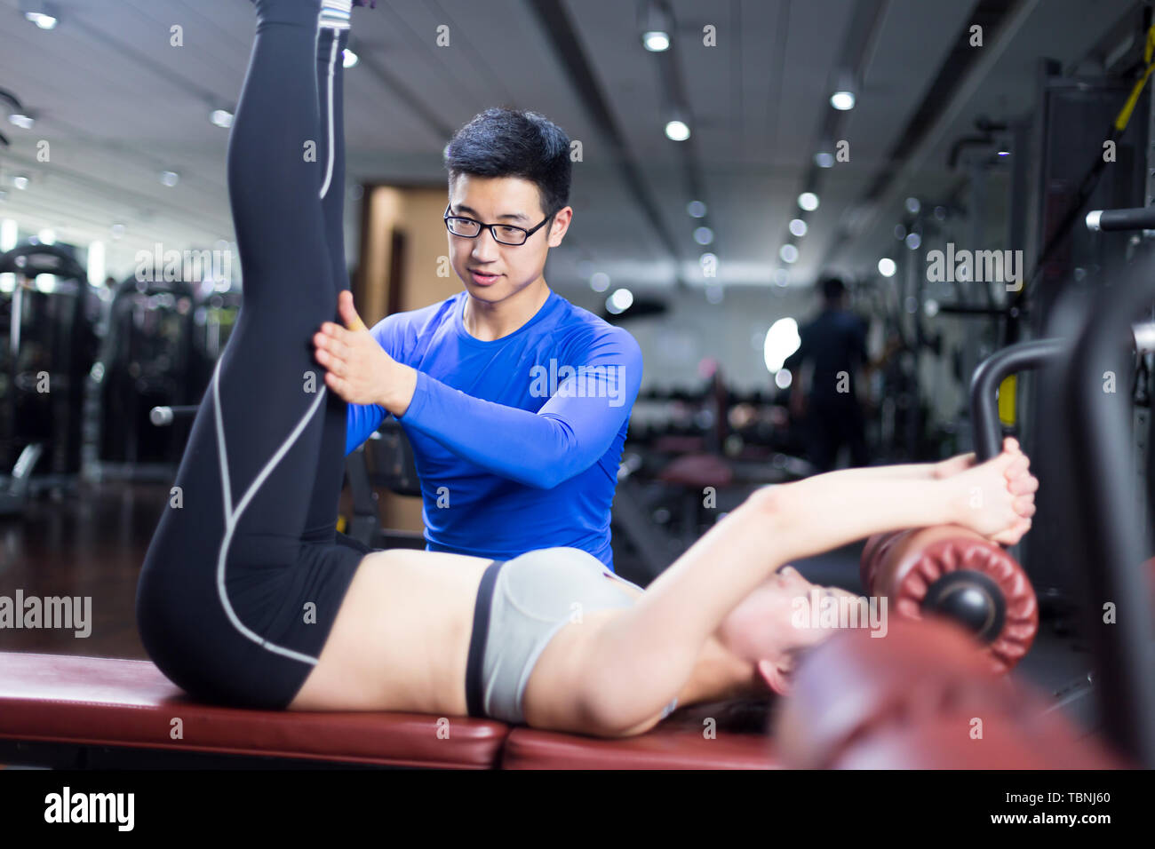 young asian people working out in modern gym Stock Photo - Alamy