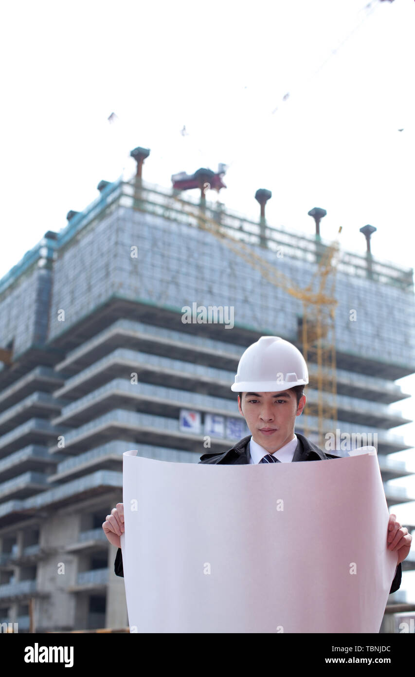 Staff at the construction site Stock Photo - Alamy