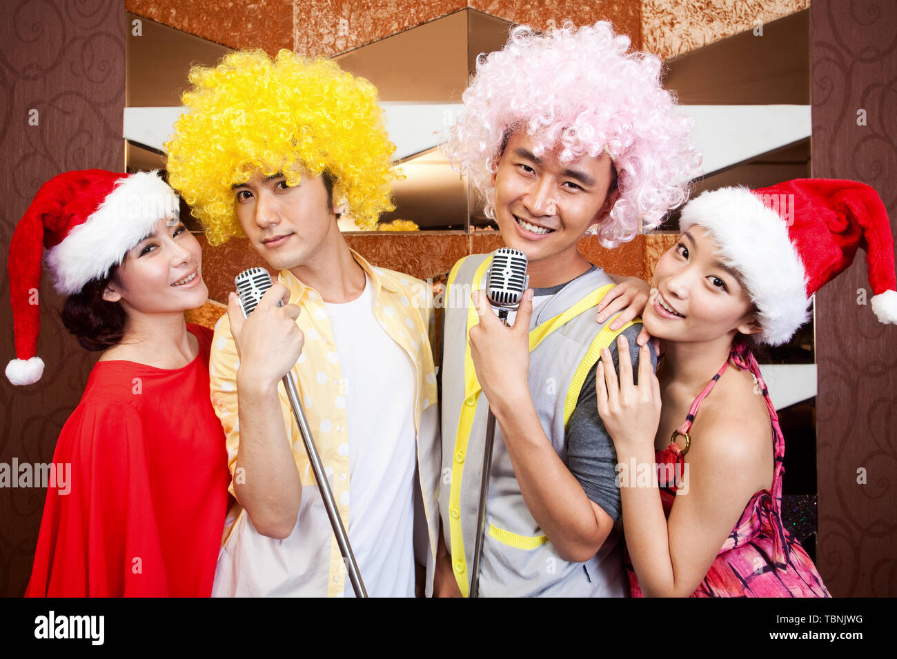 Four friends, party, party Stock Photo - Alamy