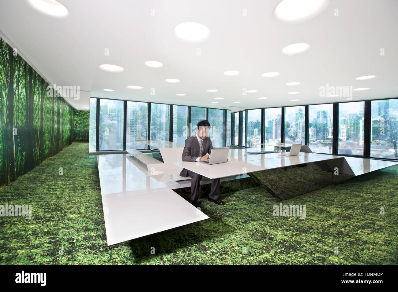 Male white collar worker working in office Stock Photo - Alamy