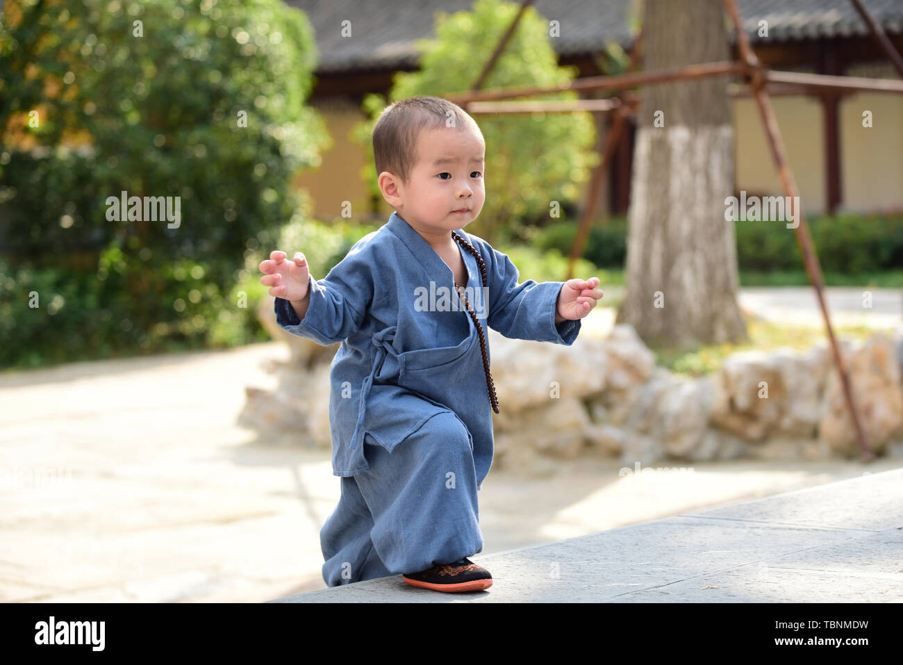 Cute little monk, children's photography Stock Photo - Alamy