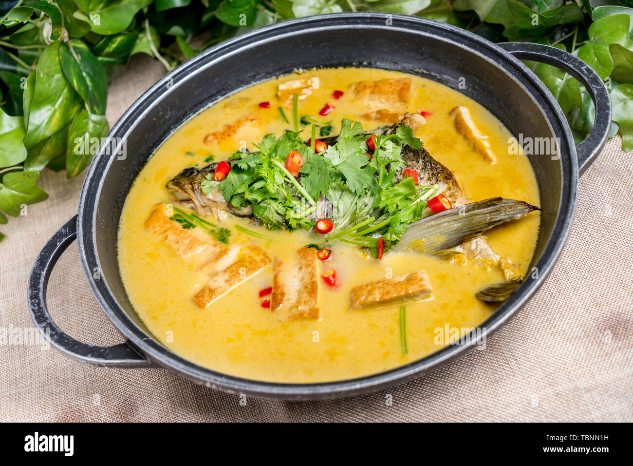 Chinese fish head soup hi-res stock photography and images - Alamy