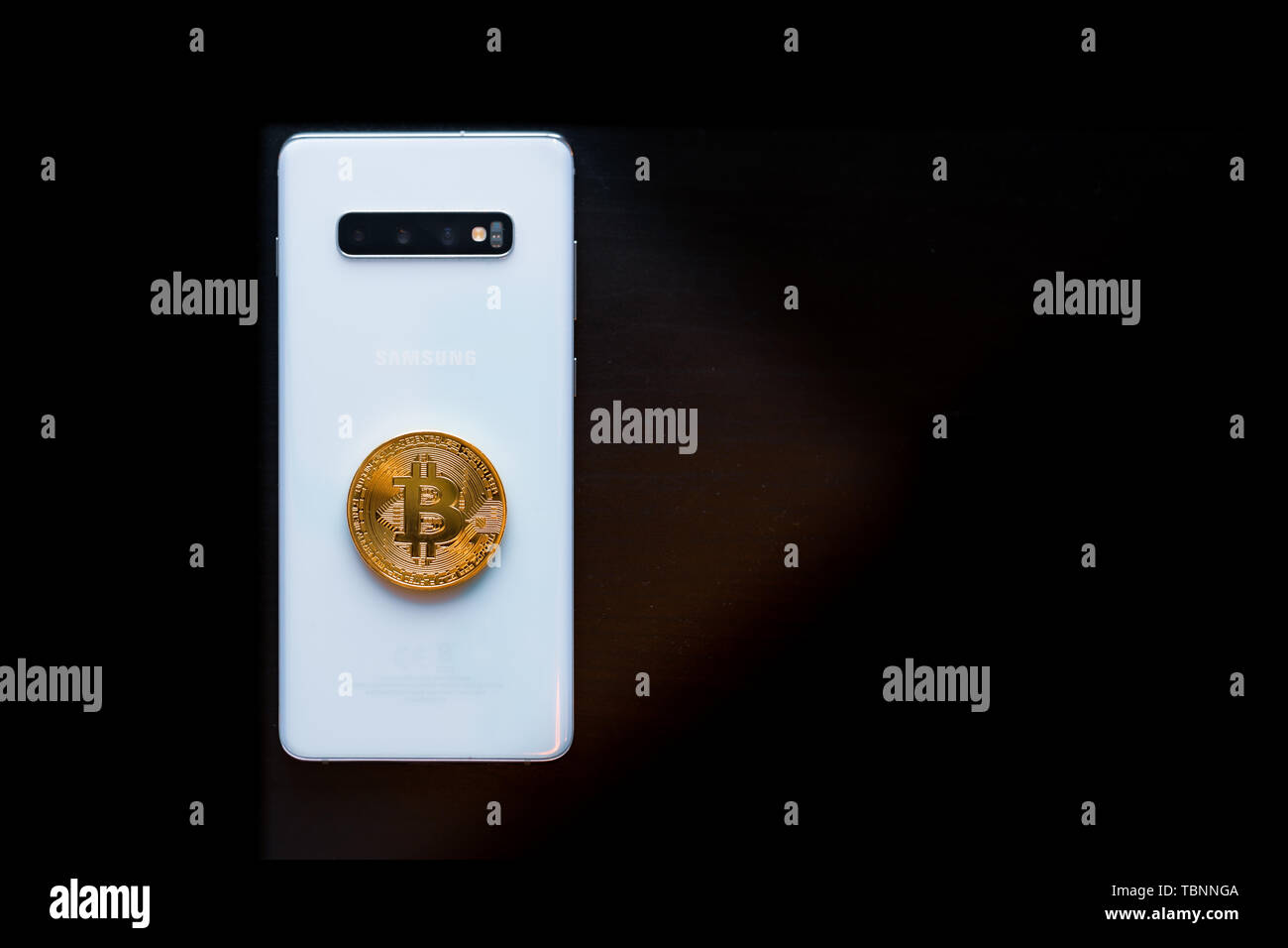 Digital currency on a smart phone hi-res stock photography and images ...
