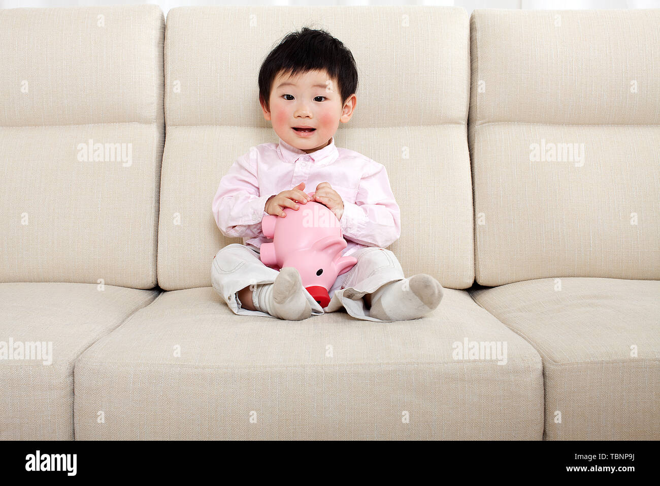 A child acquires knowledge in a game Stock Photo - Alamy