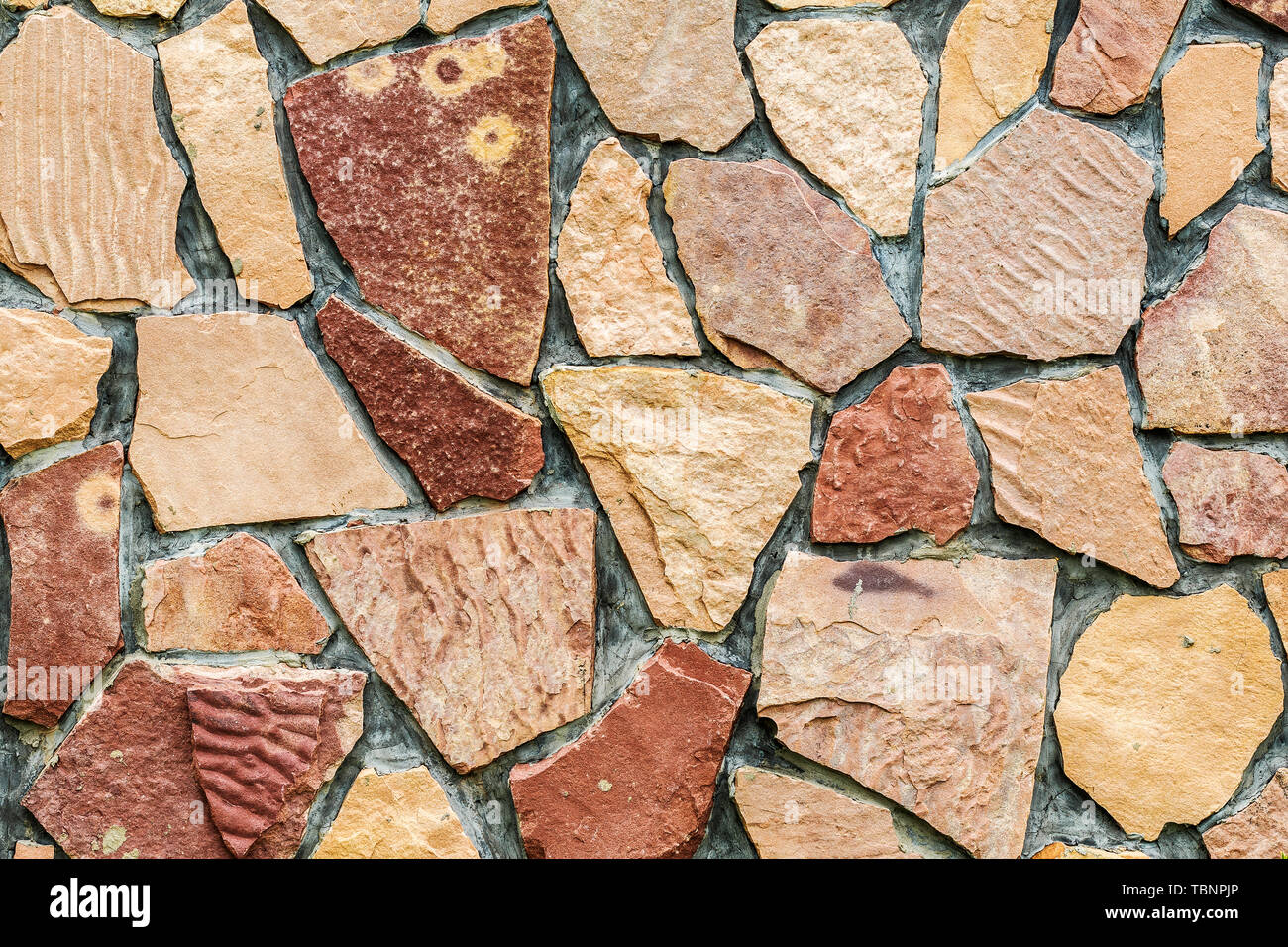 Stone wall texture background material Stock Photo - Alamy