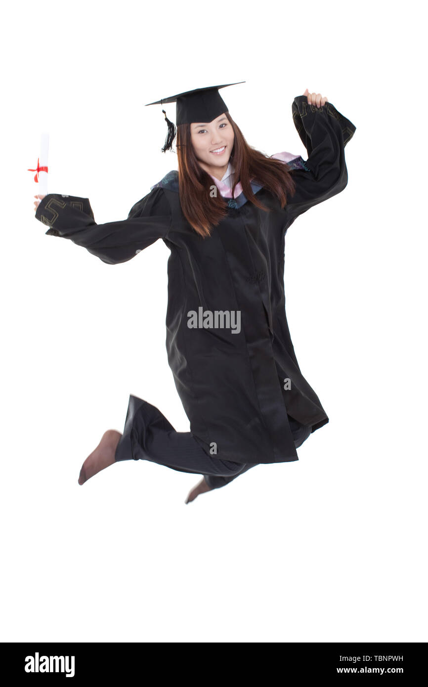 A female graduate in a bachelor's dress Stock Photo - Alamy