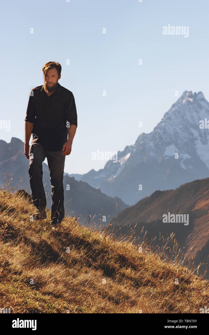 Man solo hiking in mountains travel adventure climbing extreme healthy ...