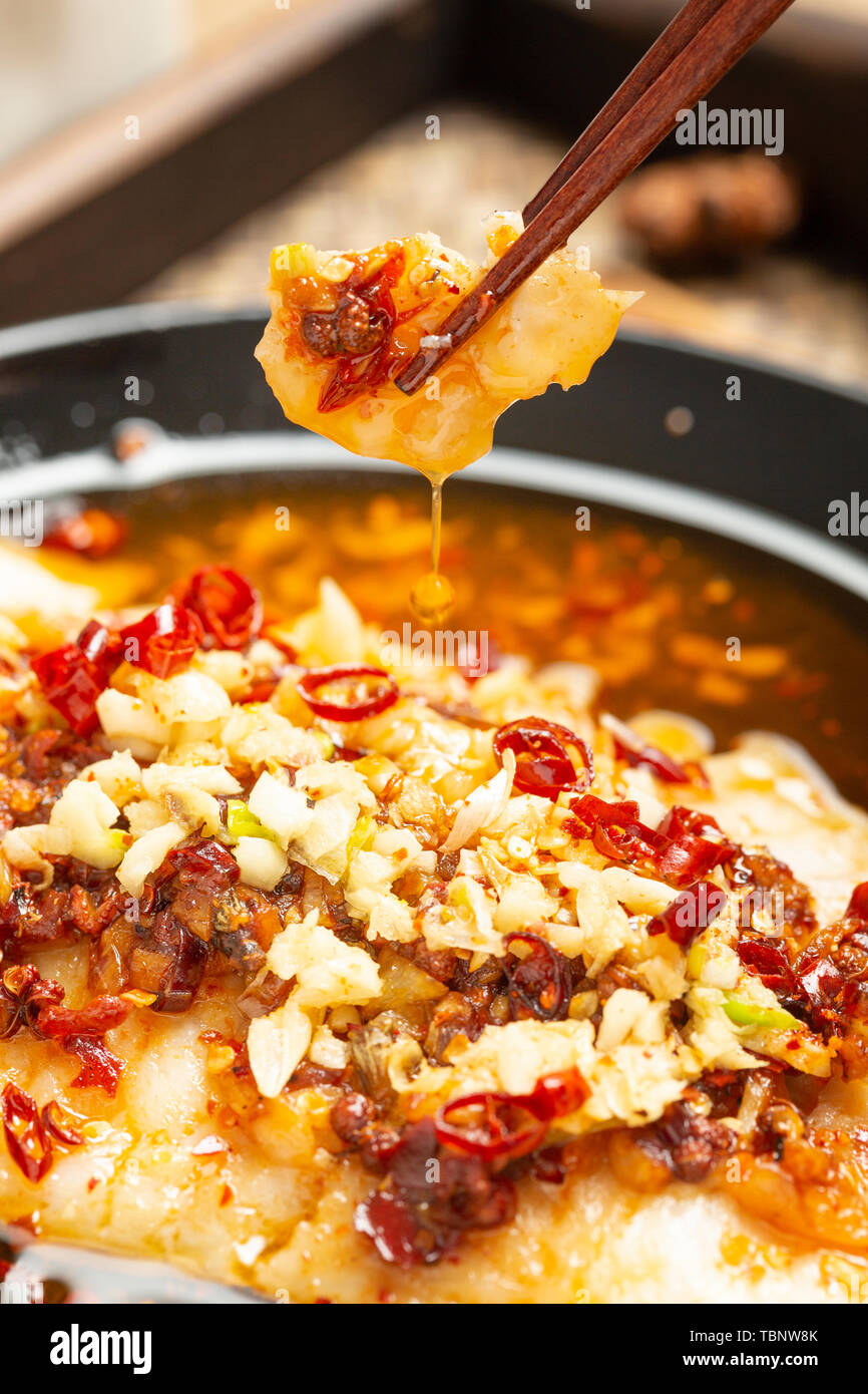 Spicy boiled fish Stock Photo - Alamy