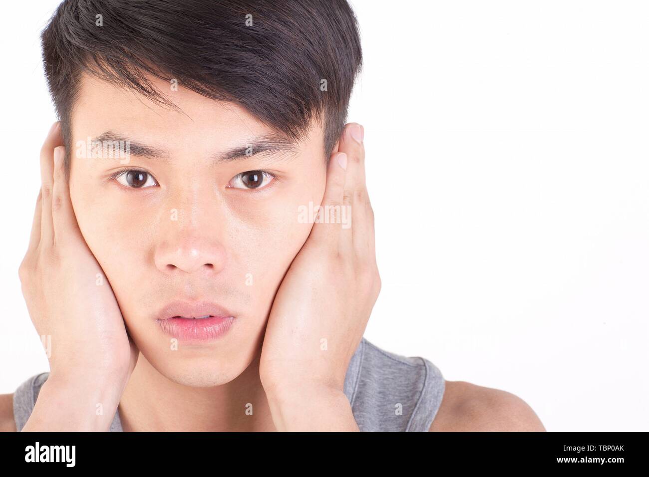 Hand face horizontal ear hi-res stock photography and images - Alamy