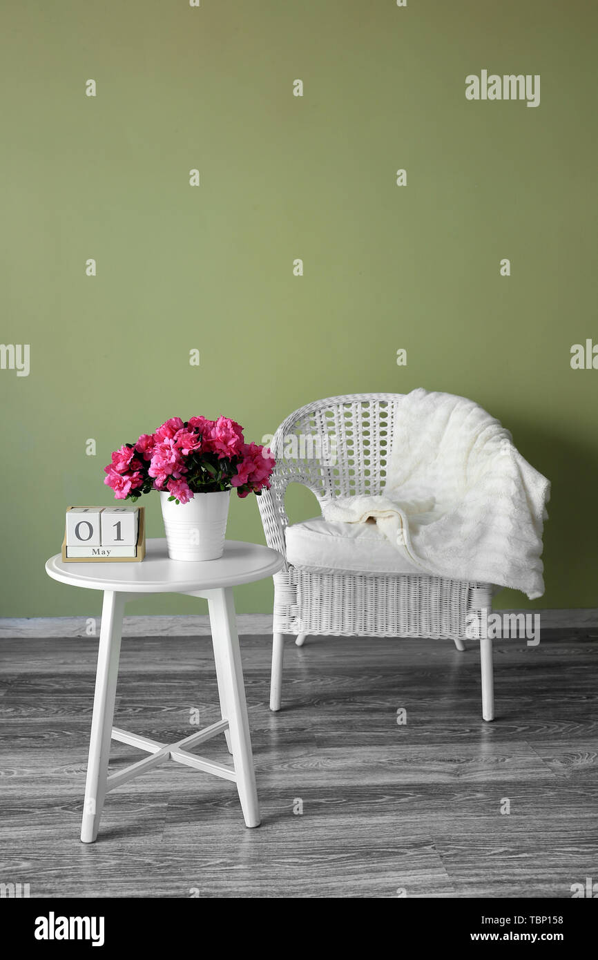 Interior of modern room with armchair and table Stock Photo - Alamy