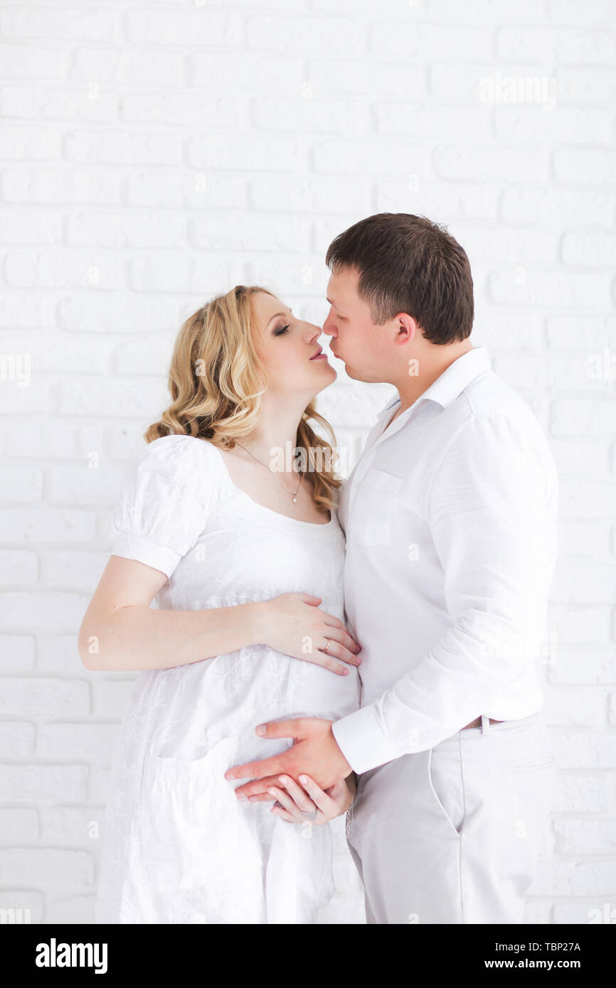 portrait of a beautiful young couple expecting a baby. photo with copy ...