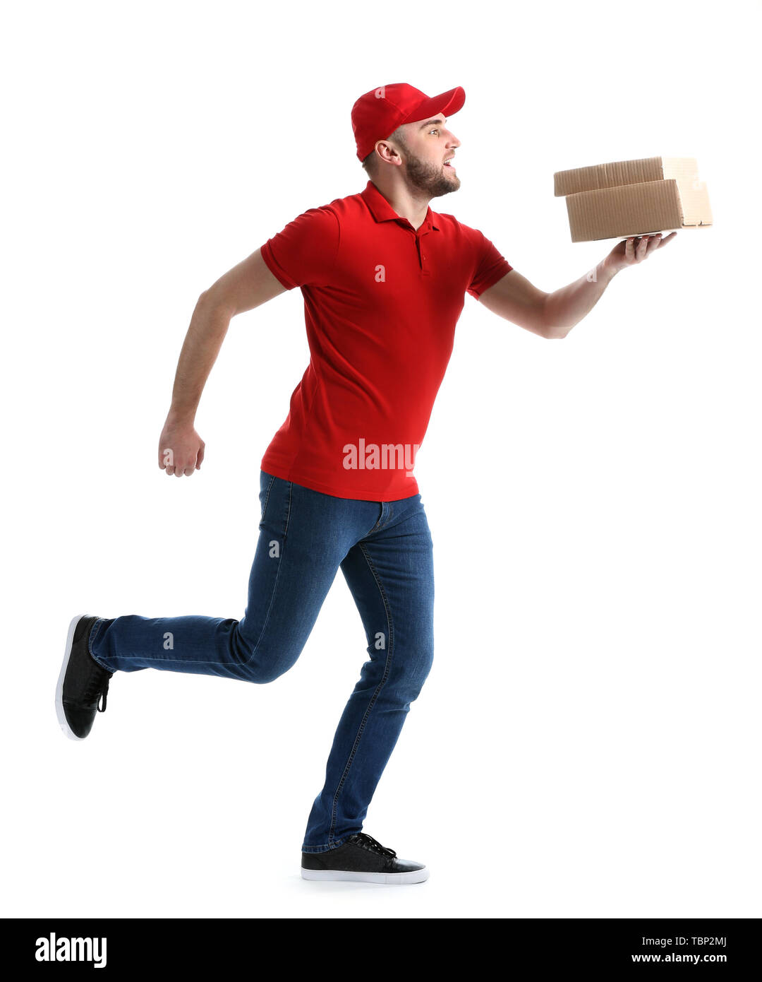 Running delivery man with boxes on white background Stock Photo - Alamy