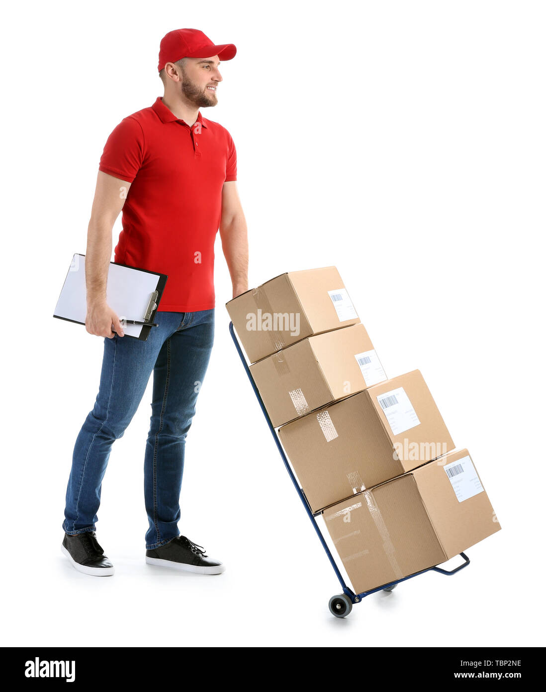 Handsome delivery man with boxes on white background Stock Photo - Alamy