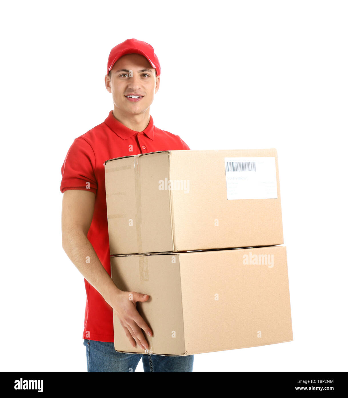 Delivery man with boxes on white background Stock Photo - Alamy