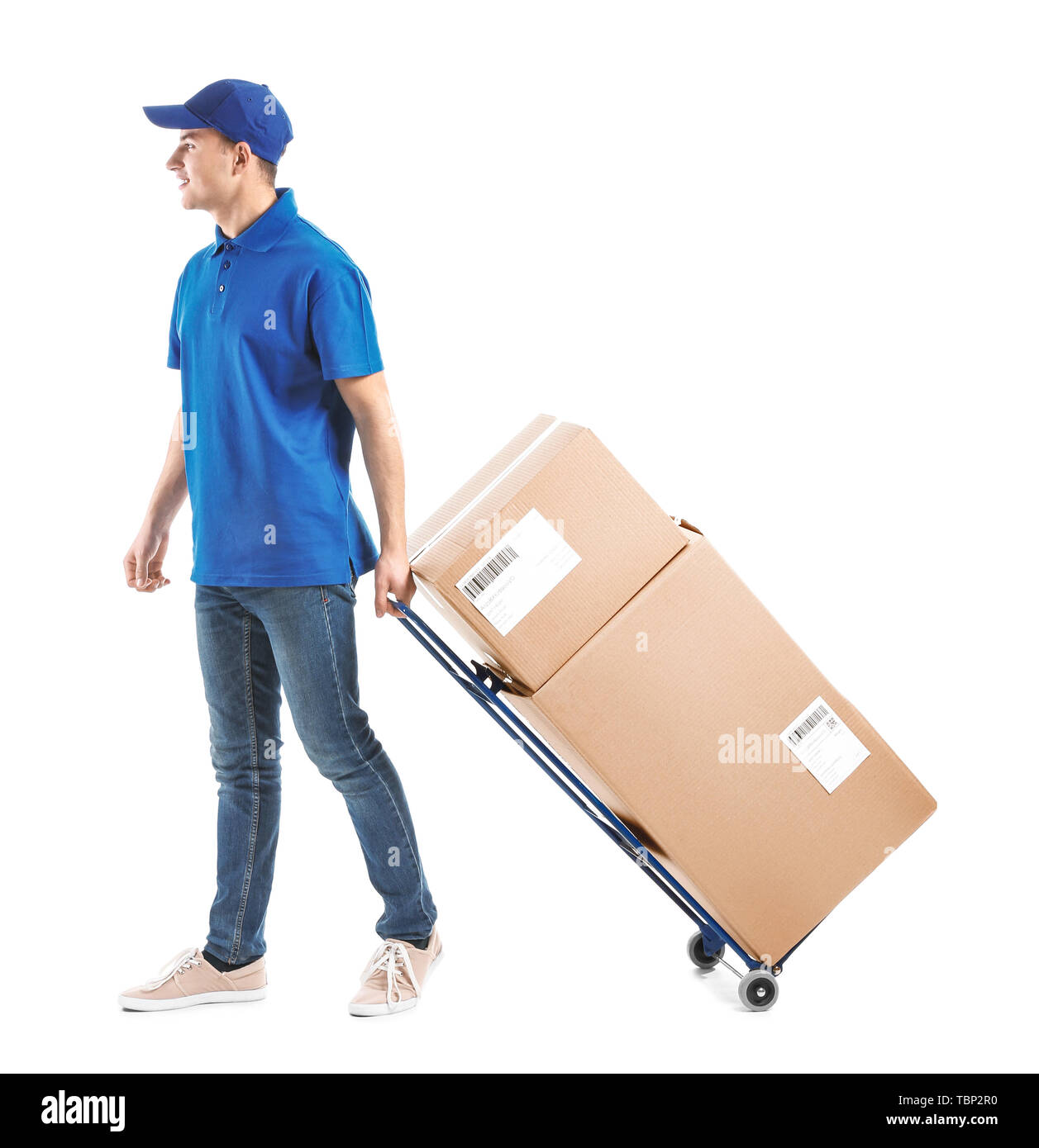 Delivery man with boxes on white background Stock Photo - Alamy