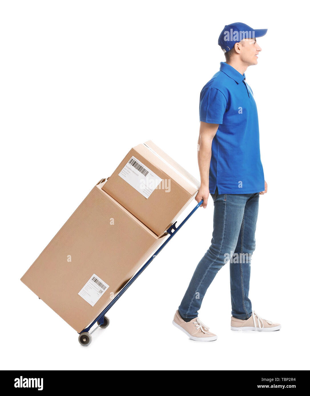 Delivery man with boxes on white background Stock Photo - Alamy