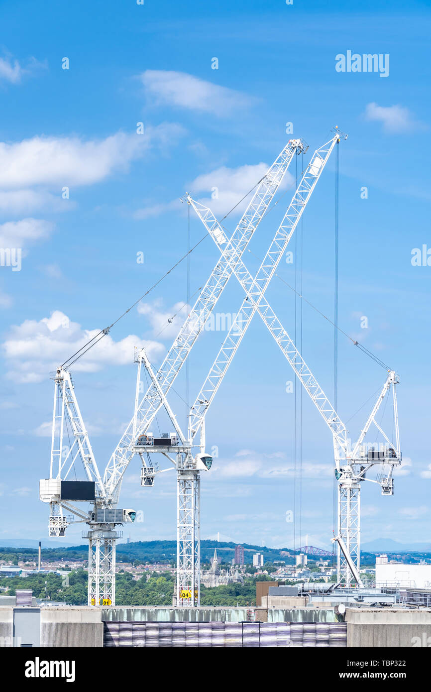 Construction crane working in construction site Stock Photo - Alamy