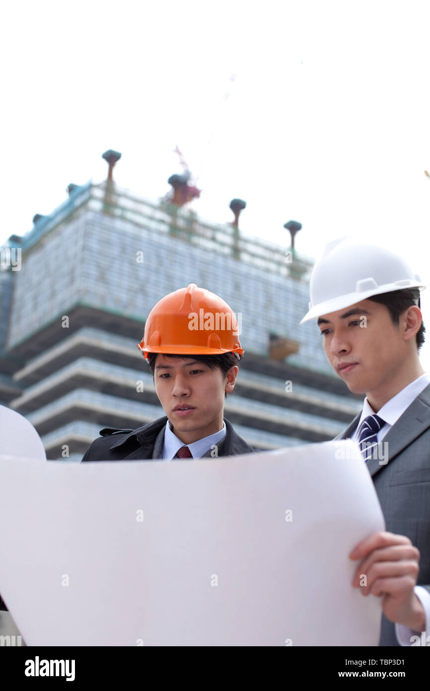 Staff at the construction site Stock Photo - Alamy
