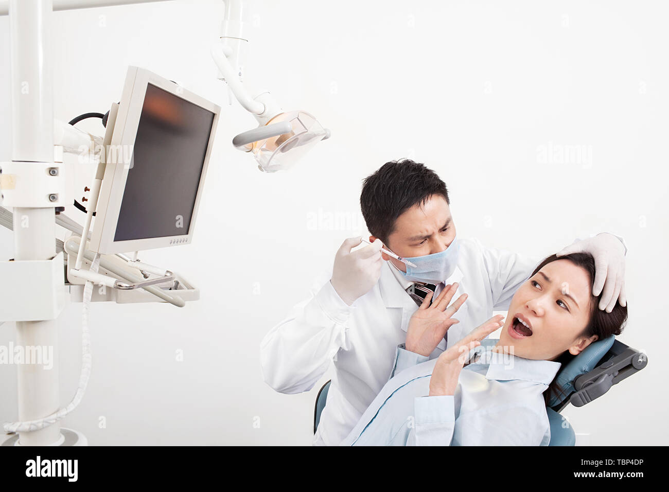 Oral examination in the clinic Stock Photo - Alamy