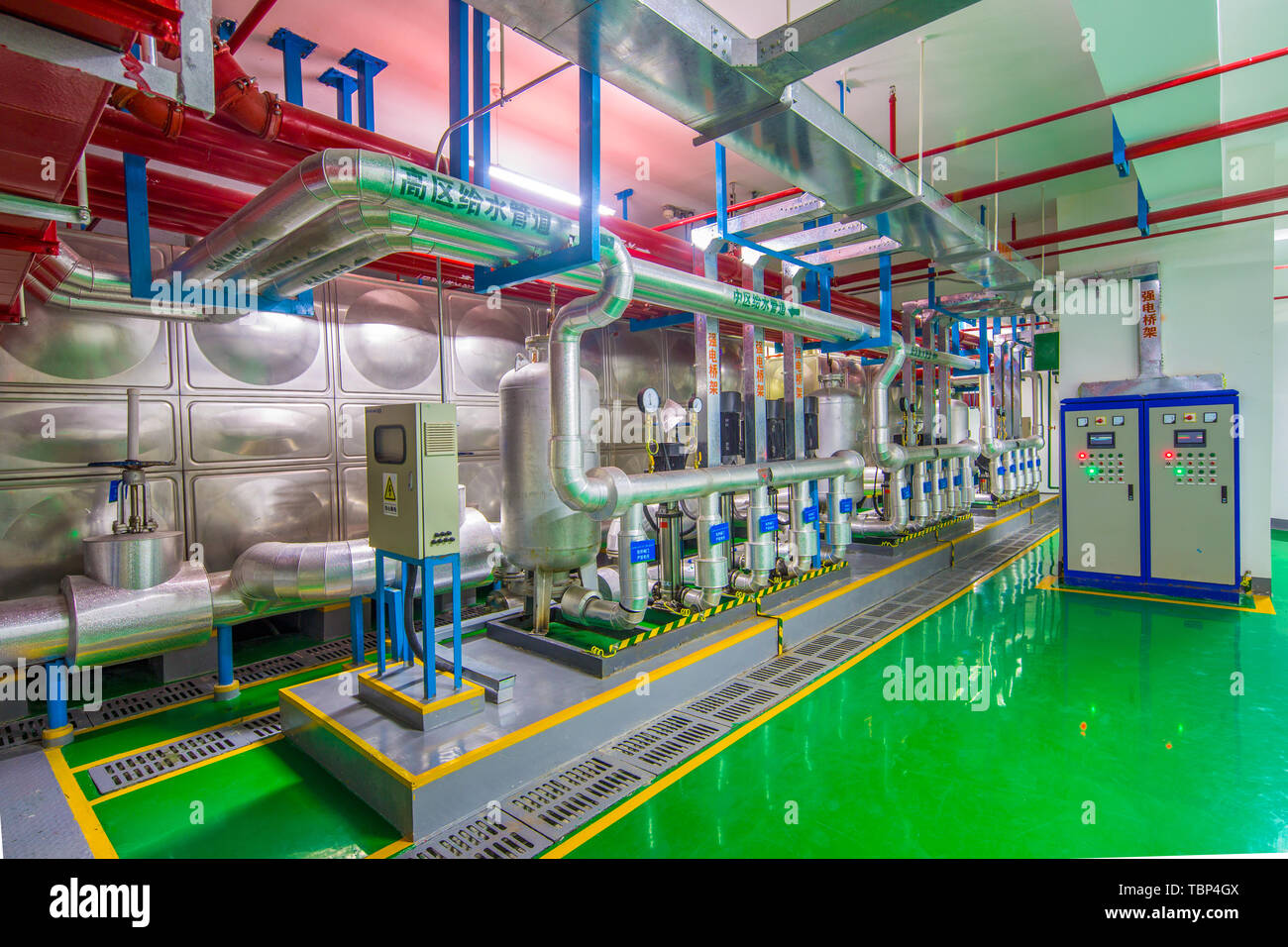 Pressurized water pump room Stock Photo - Alamy