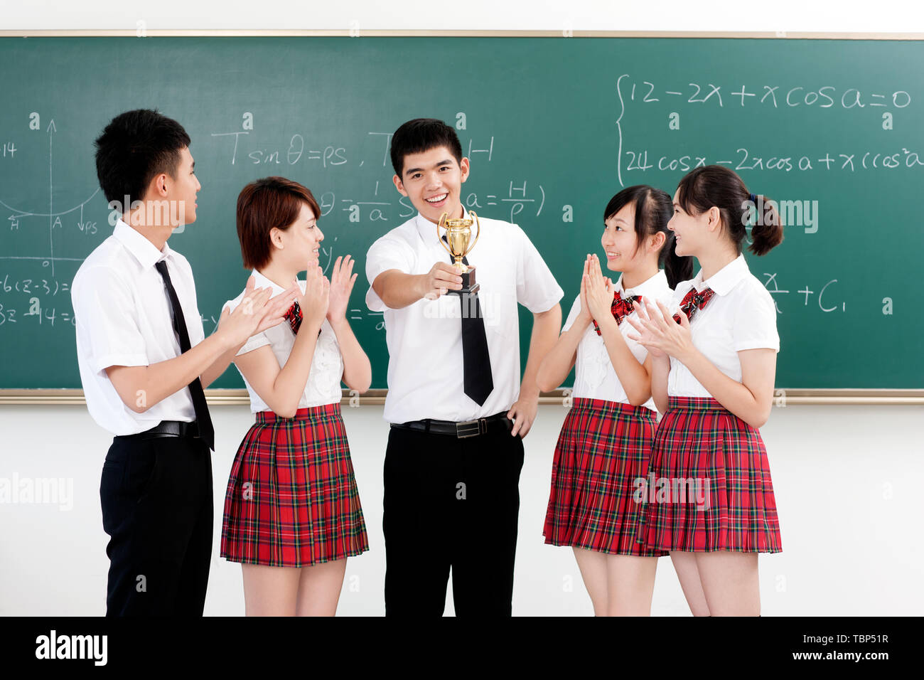 Teamwork among high school students Stock Photo - Alamy