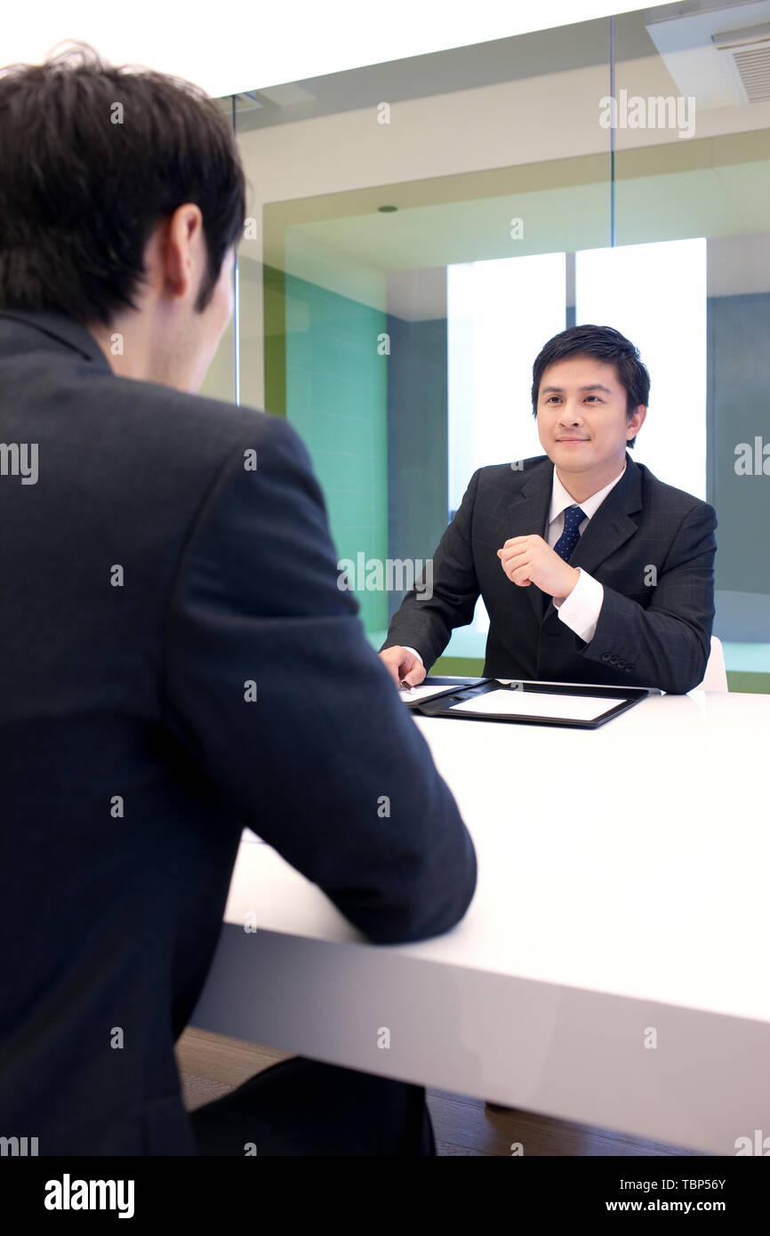 Business people interview Stock Photo - Alamy