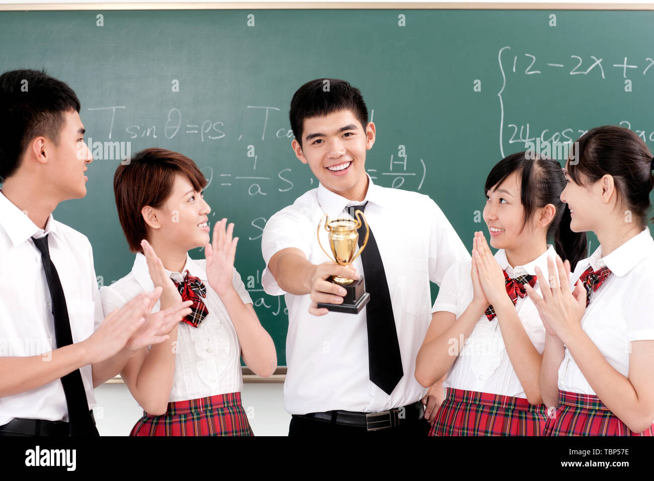 Teamwork among high school students Stock Photo - Alamy