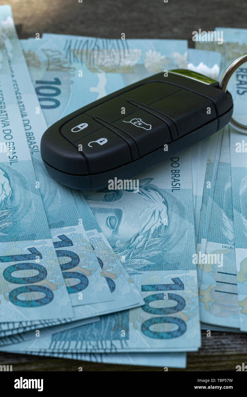 Brazilian money and car keys / concept Stock Photo - Alamy