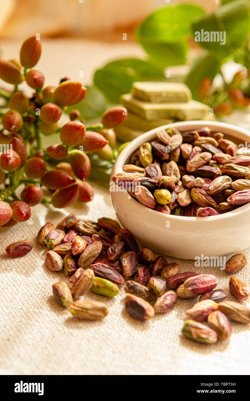 Sweet, delicate, fragrant nuts, Bronte pistachios with brilliant green ...