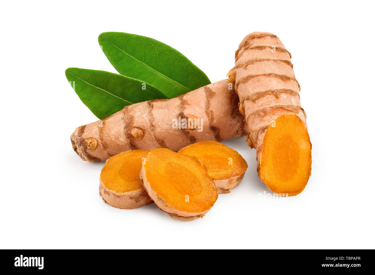 turmeric root and slices isolated on white background Stock Photo - Alamy
