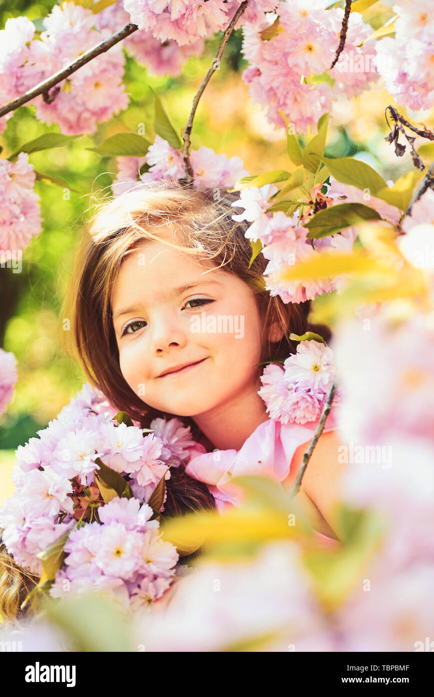 Little girl in sunny spring. Summer girl fashion. Happy childhood ...