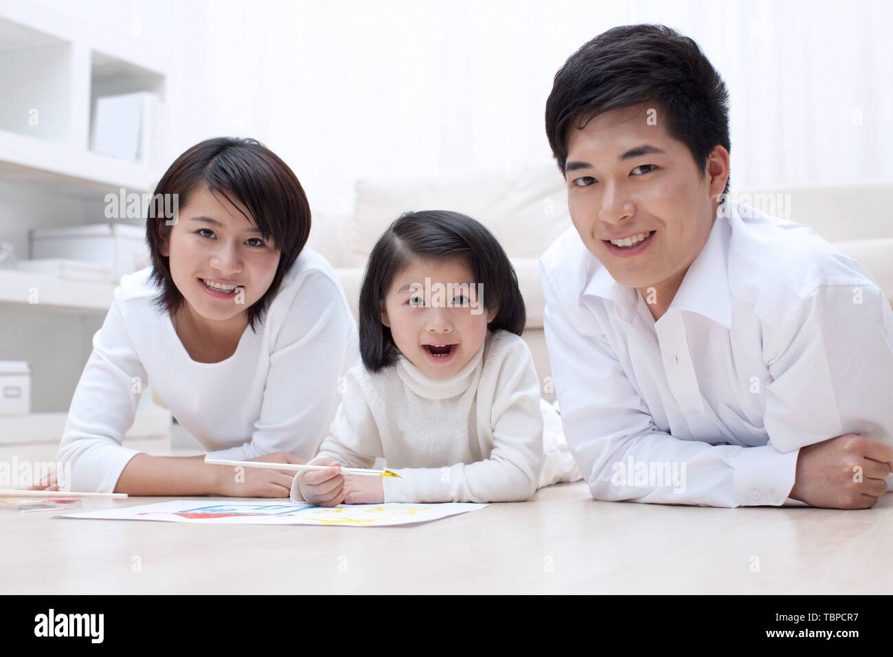 family of three Stock Photo - Alamy