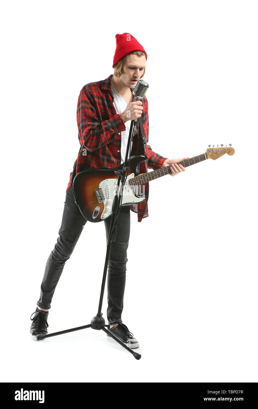 Handsome young singer playing guitar on white background Stock Photo ...