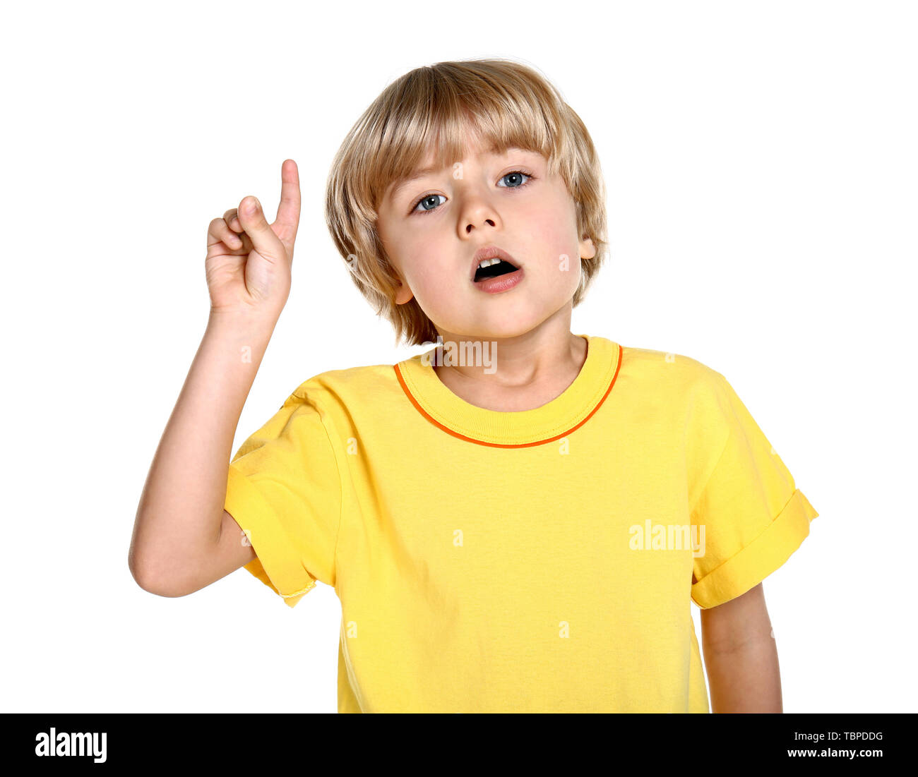 Cute little boy with raised index finger on white background Stock ...
