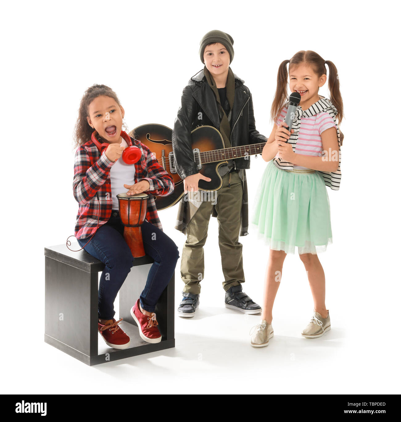 Band of little musicians on white background Stock Photo - Alamy