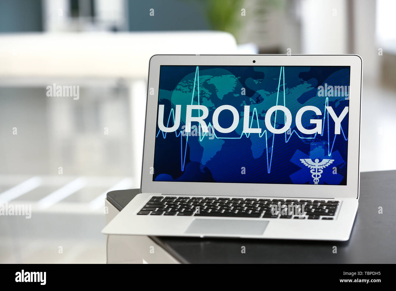 Laptop with word UROLOGY on screen in doctor's office Stock Photo - Alamy
