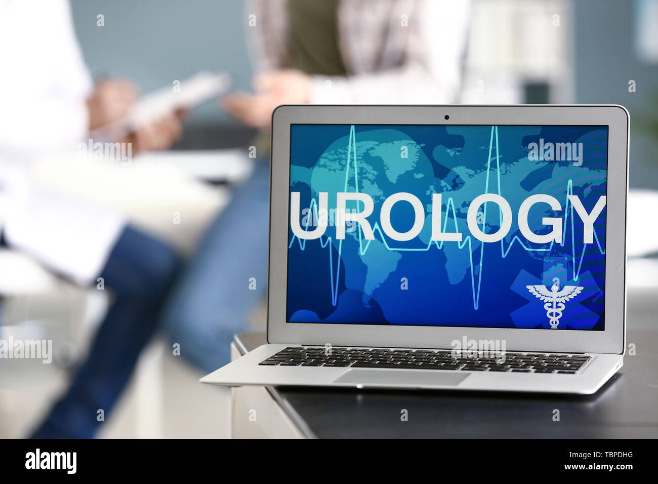 Laptop with word UROLOGY on screen in doctor's office Stock Photo - Alamy