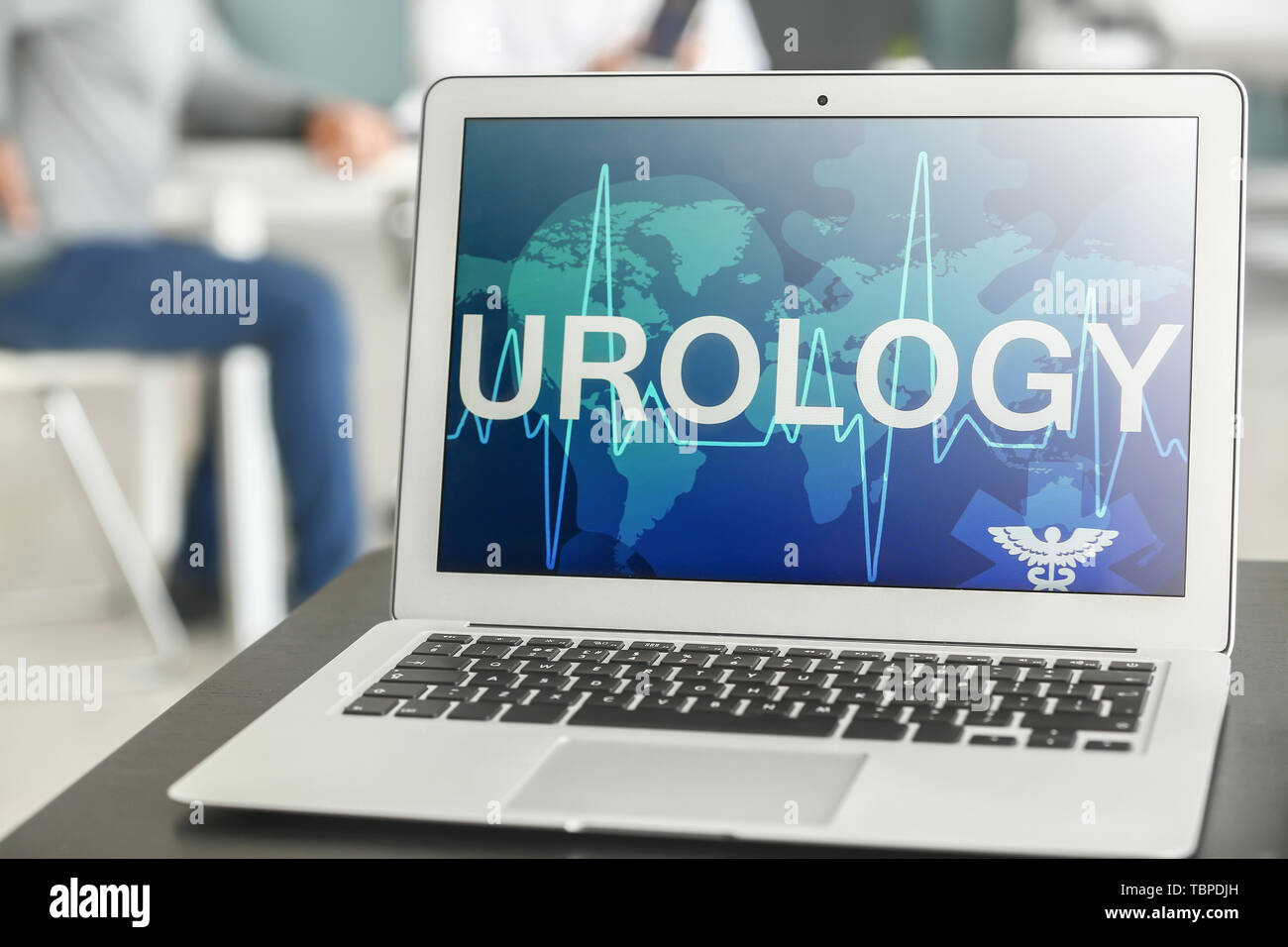 Laptop with word UROLOGY on screen in doctor's office Stock Photo - Alamy