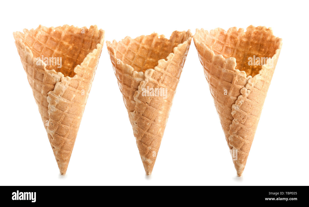 Crunchy wafer cones on white background Stock Photo - Alamy