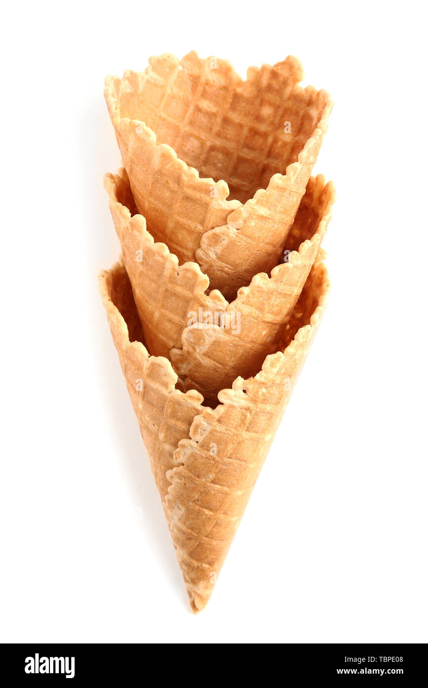 Crunchy wafer cones on white background Stock Photo - Alamy