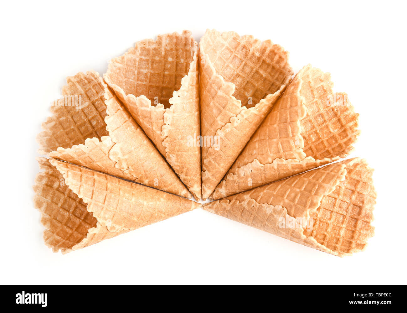 Crunchy wafer cones on white background Stock Photo - Alamy