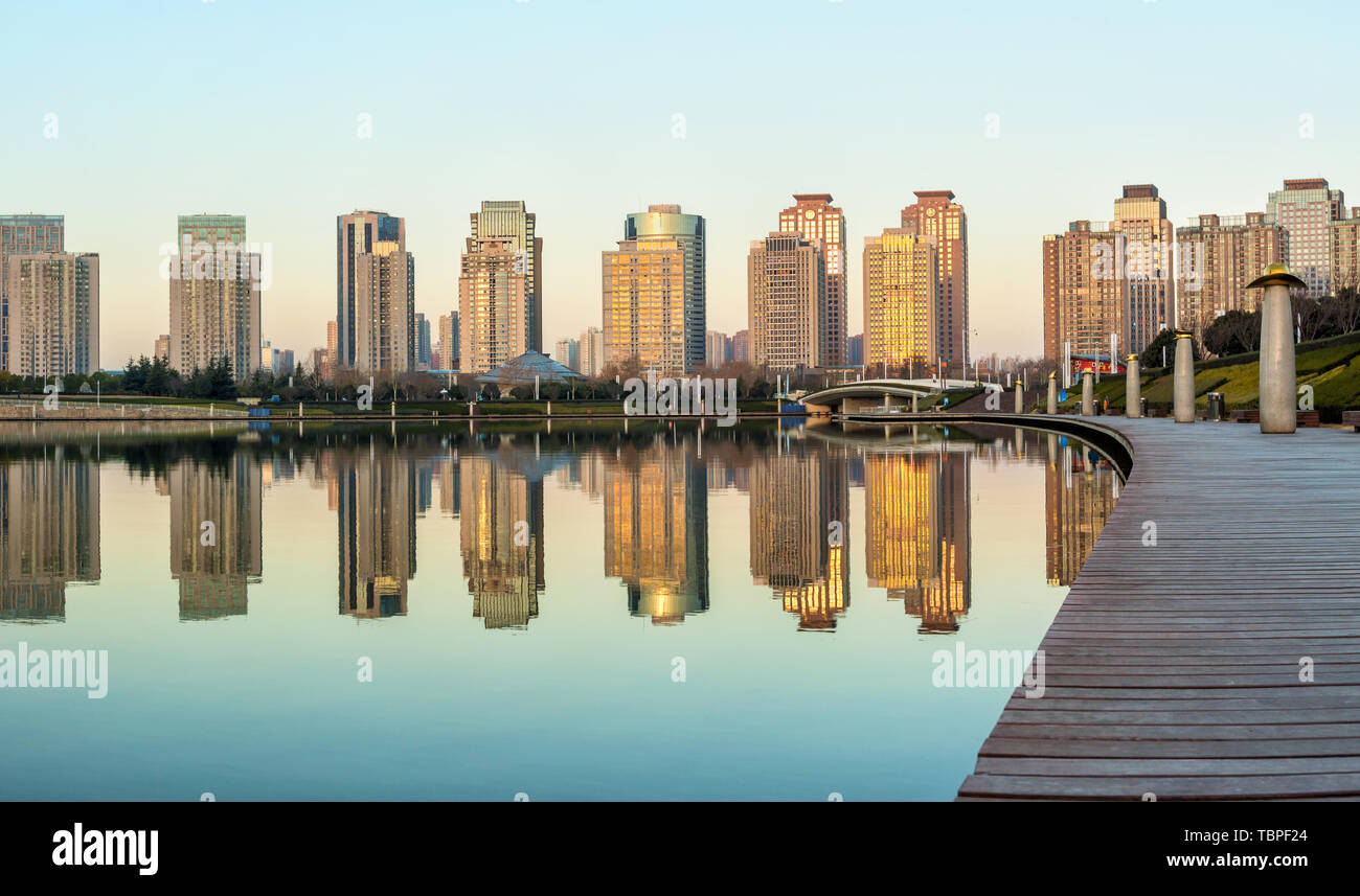 At dusk, CBD urban landscape in Zhengdong New District, Zhengzhou City ...