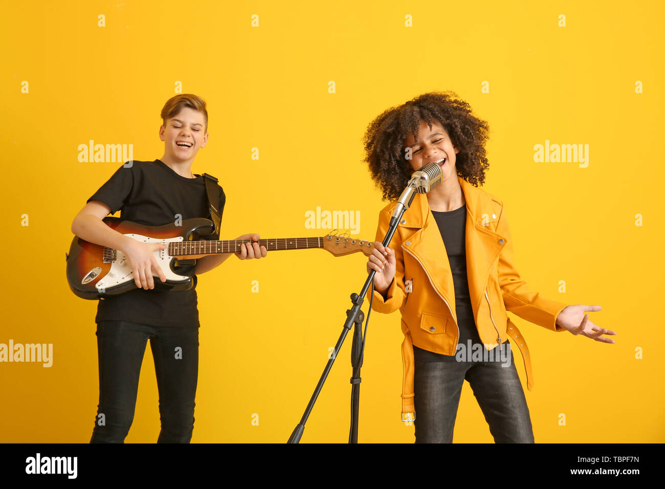 African teenager boy playing instrument hi-res stock photography and ...