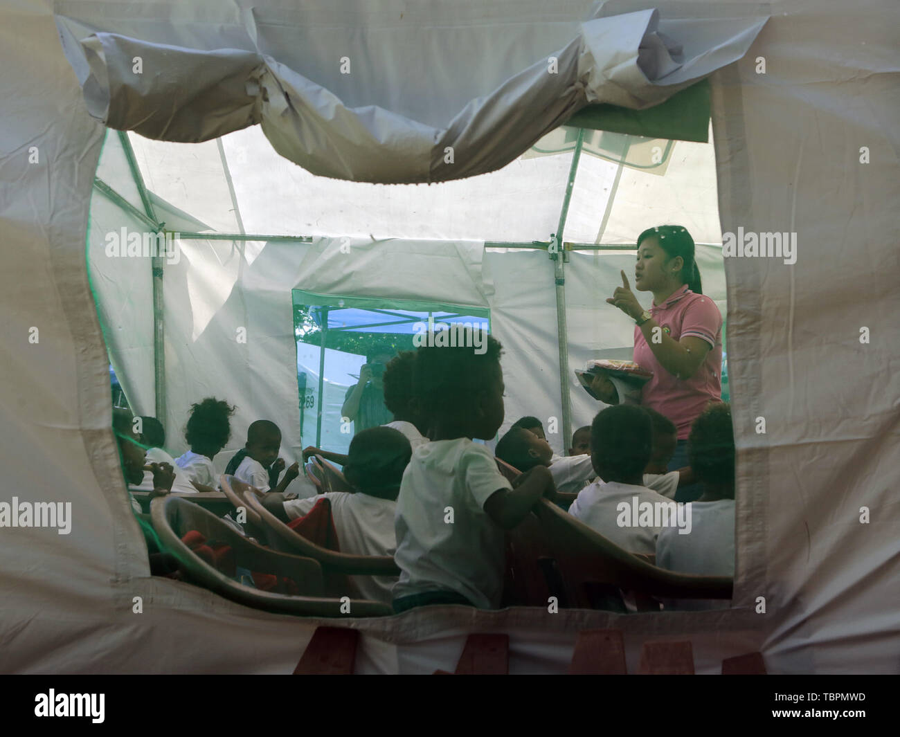 Pampanga Province, Philippines. 3rd June, 2019. A teacher gives lessons ...