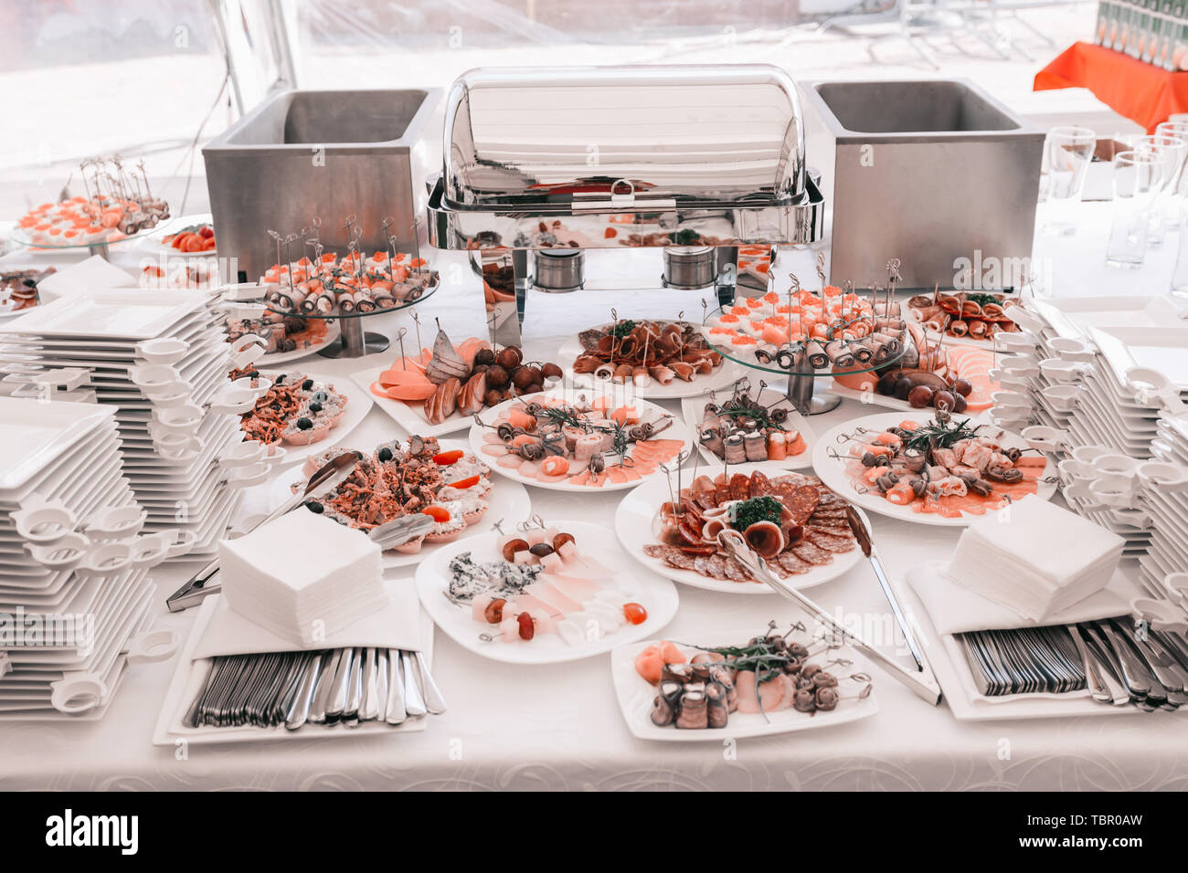variety of snacks and dishes on the table in the modern restaurant ...