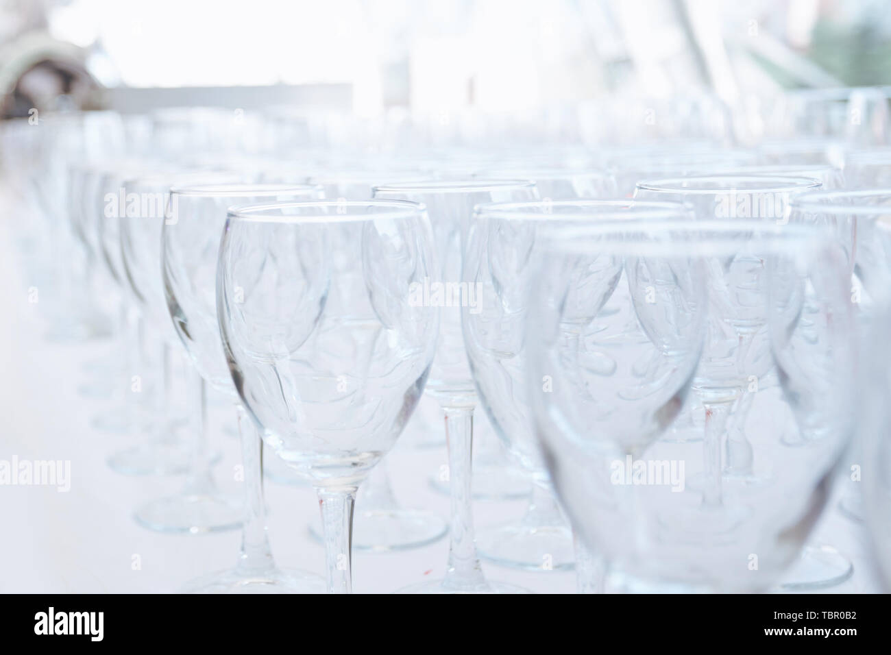 empty glass glasses on the table in the restaurant . festive reception ...