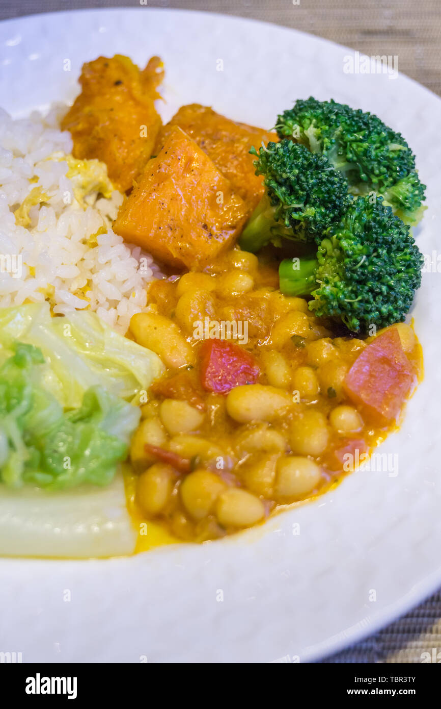 A plate of egg fried rice with broccoli steamed pumpkin cabbage Stock ...