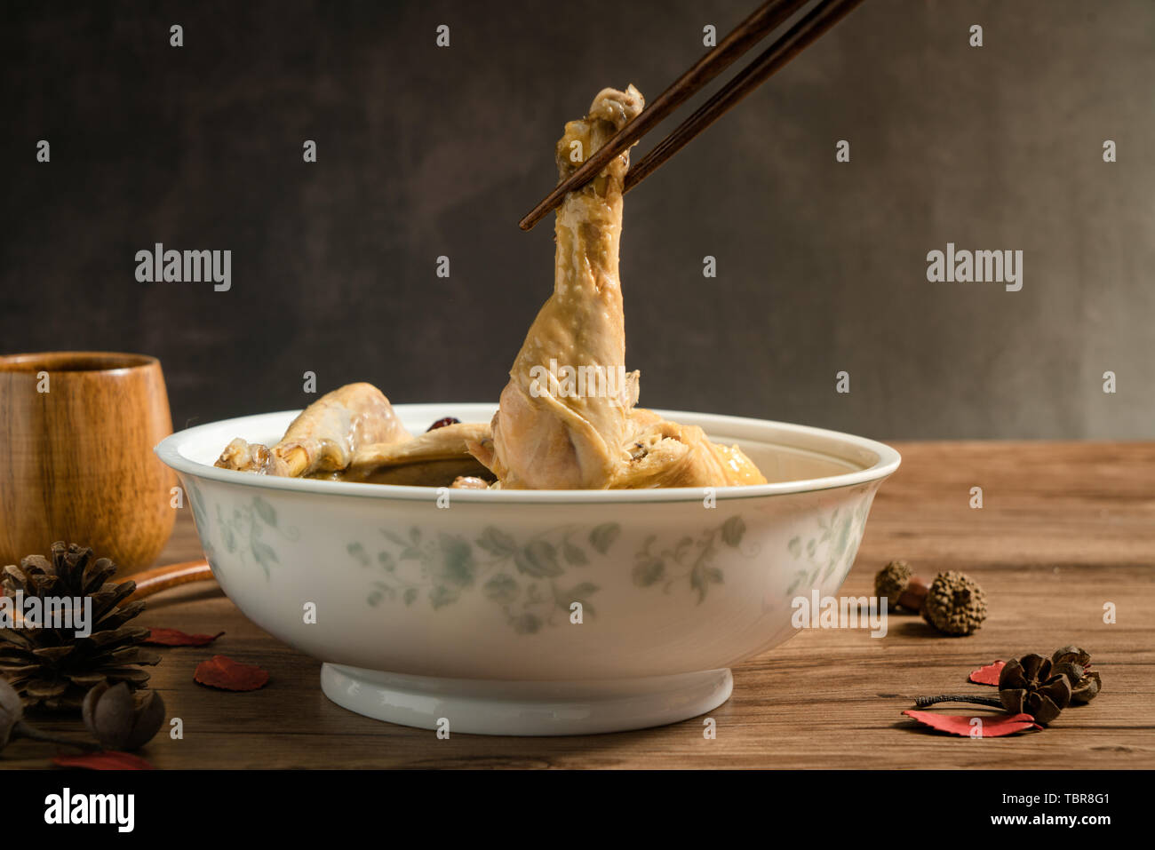 Chicken soup with wood pattern background Stock Photo - Alamy